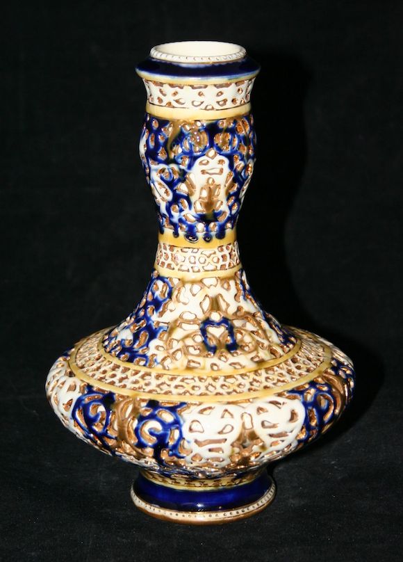 Bonhams : A Zsolnay (Pecs) reticulated double-skinned bottle vase