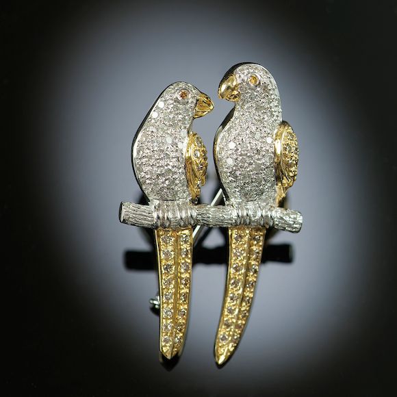 Bonhams : A two colour diamond set lovebird brooch