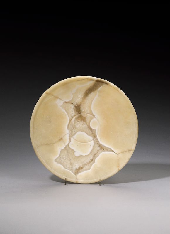 Bonhams : A large Egyptian alabaster shallow dish