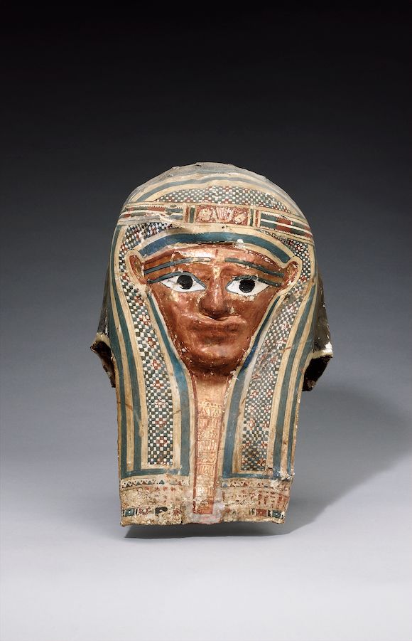 Bonhams : A large Egyptian cartonnage mummy mask