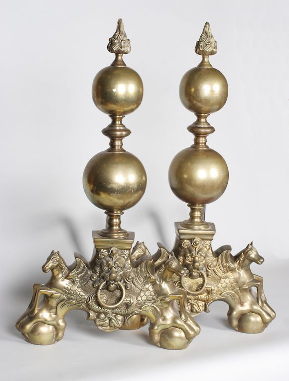 Bonhams : A large pair of Baroque style brass andirons