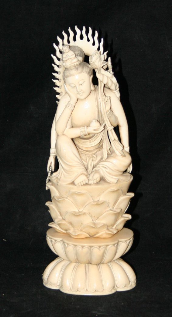 Bonhams : A carved ivory figure of a six-armed deity, probably South ...