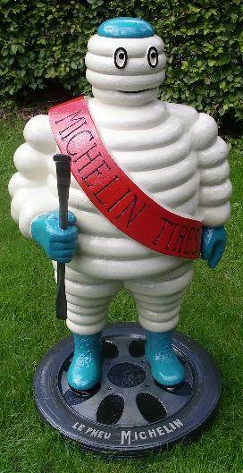 Bonhams Cars : A hand painted cast fibreglass Michelin man,