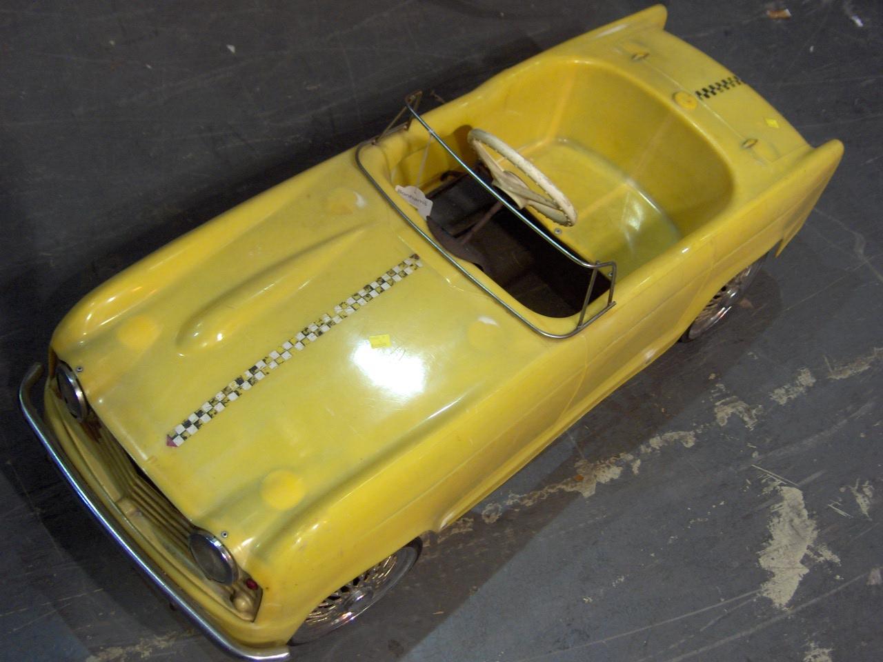 Bonhams Cars : A Tri-Ang Triumph TR4 pedal car 1960s,