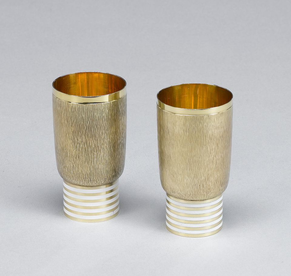 Bonhams : GERALD BENNEY : A pair of silver-gilt and enamelled beakers ...