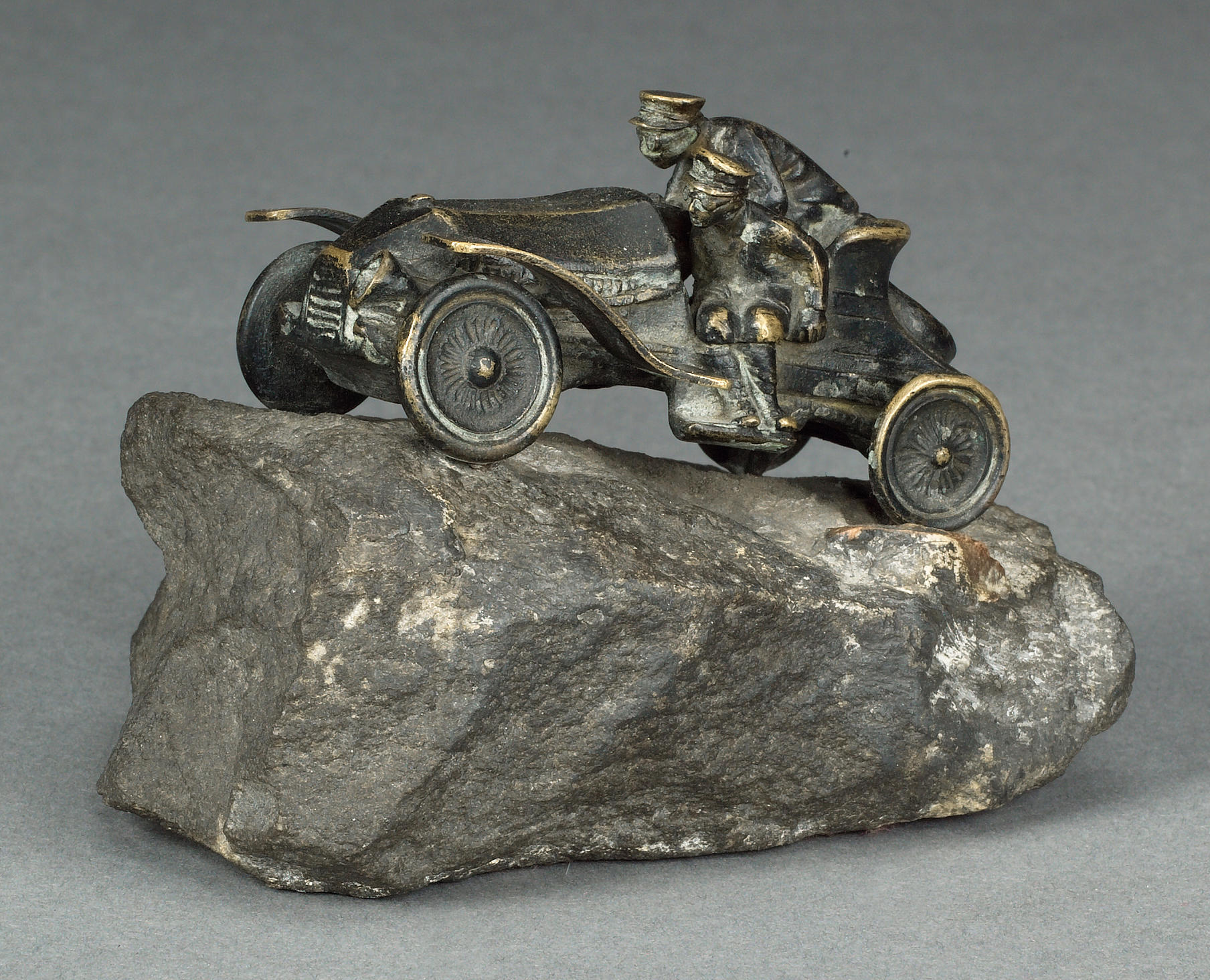Bonhams Cars : A bronze sculpture of a veteran racing car,