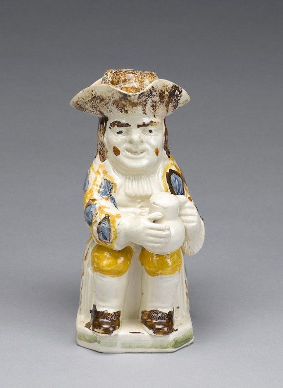 Bonhams : A pearlware Toby jug and cover, circa 1810-20