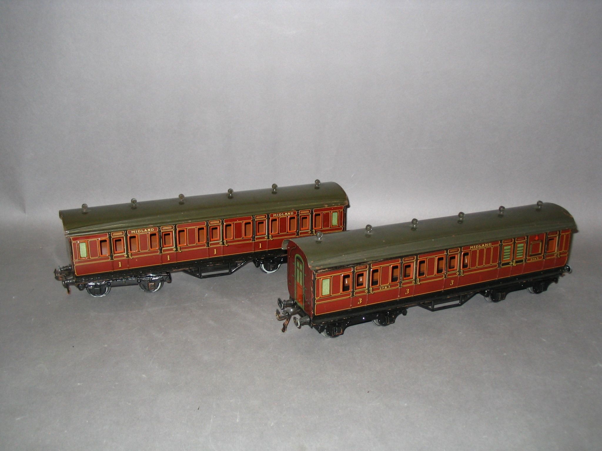 double bogie coaches in brown and cream - auctions & price archive