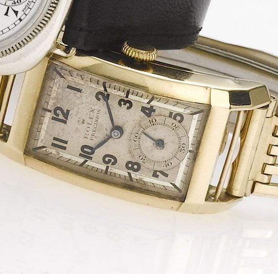 Rolex. A rare 9ct gold rectangular curved wristwatch - auctions & price ...