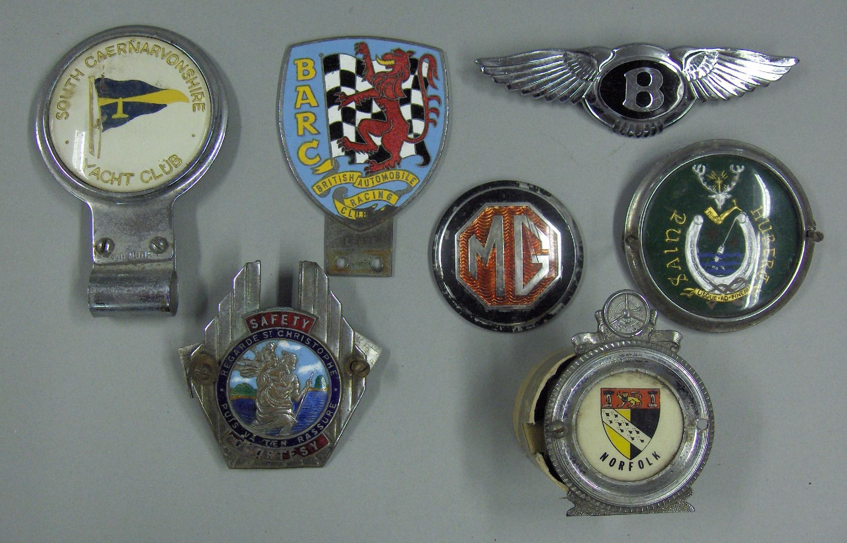 Bonhams Cars : Seven car badges,