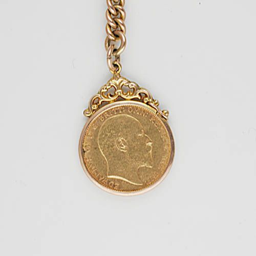 Bonhams : A 9ct gold graduated curb-link double Albert chain