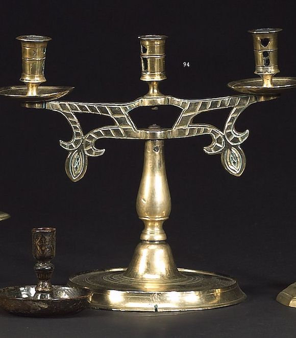 Bonhams : A late 15th/ early 16th century Dutch gilt brass candelabra