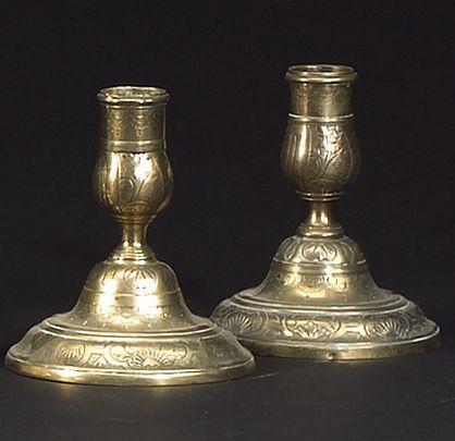 Bonhams : A pair of late 18th century French brass dwarf candlesticks