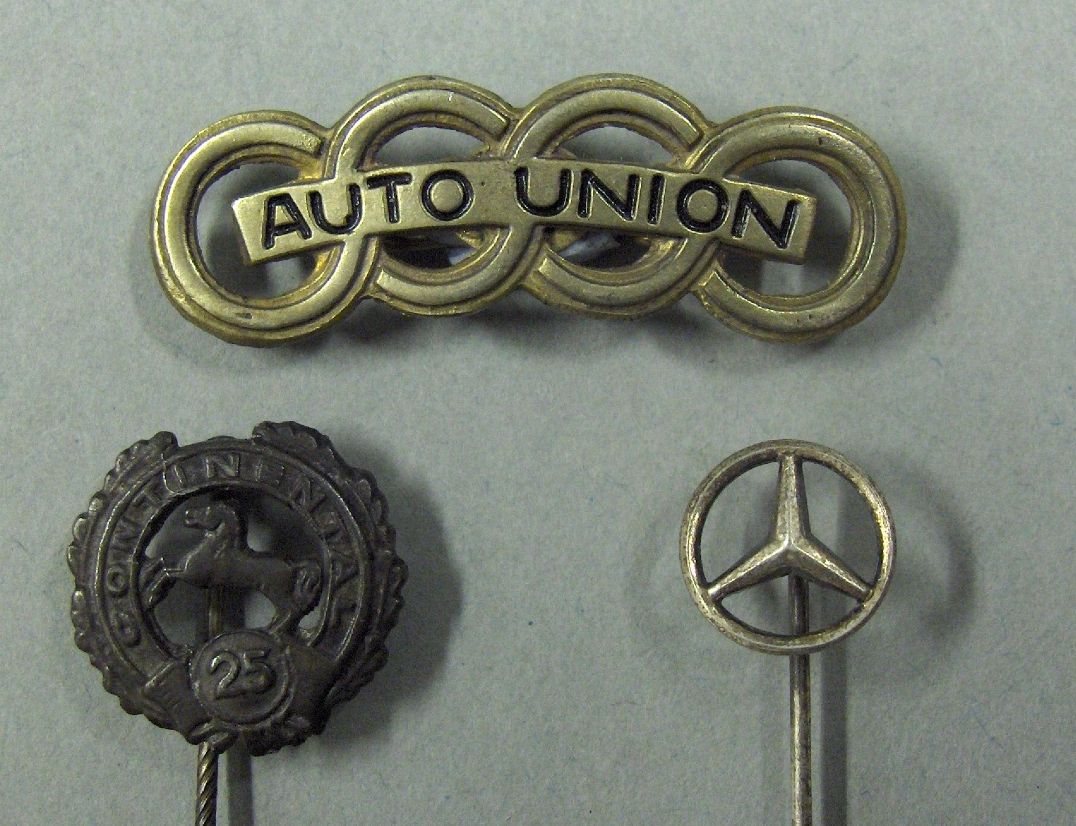 Bonhams Cars : Three motoring pin-badges,