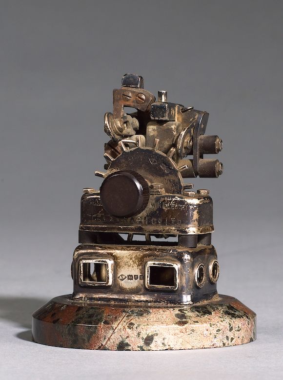 Bonhams : A Marconi silver telegraph table lighter