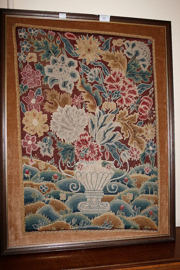 Bonhams : A needlework panel depicting a campana urn and flowers, and a ...