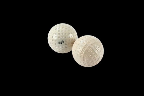 Bonhams : A pair of mesh patterned golf balls