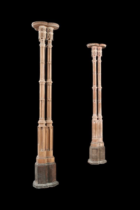 Bonhams : A pair of Puginesque Gothic torcheres in stripped pine