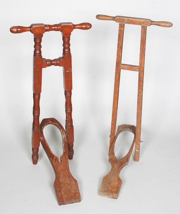 Bonhams : An Edwardian walnut folding boot jack