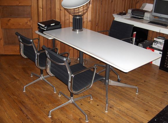 Bonhams : A Charles and Ray Eames aluminium and formica dining table