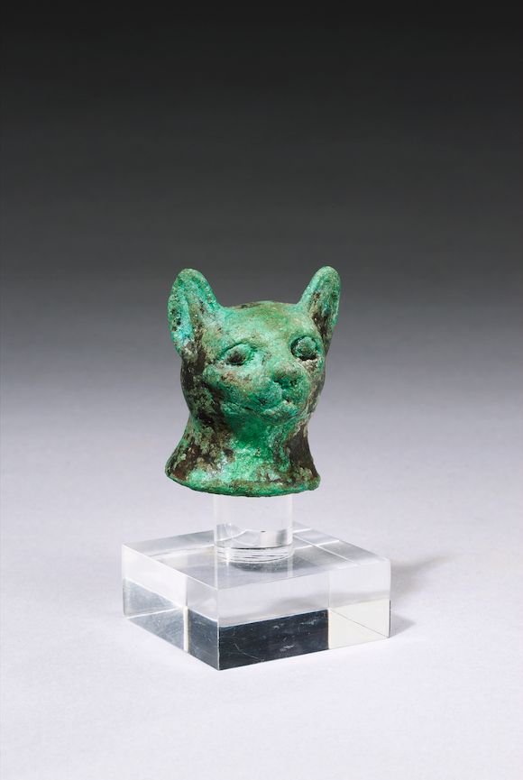 Bonhams : An Egyptian bronze cat head