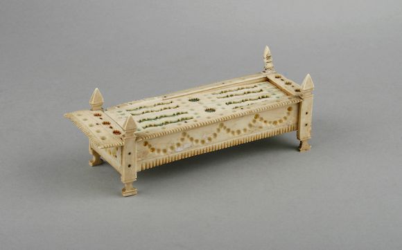 Bonhams : A 19th Century prisoner of war carved bone cased set of dominoes