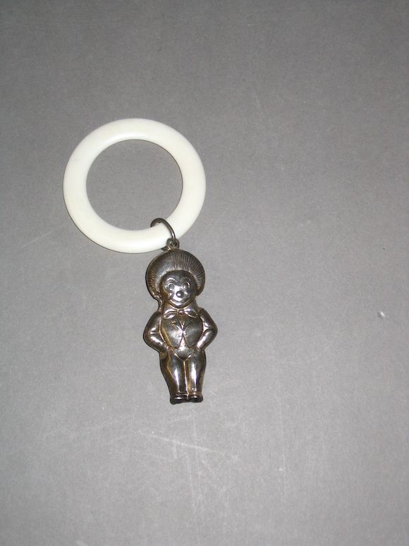Bonhams : Silver Golly rattle and teething ring