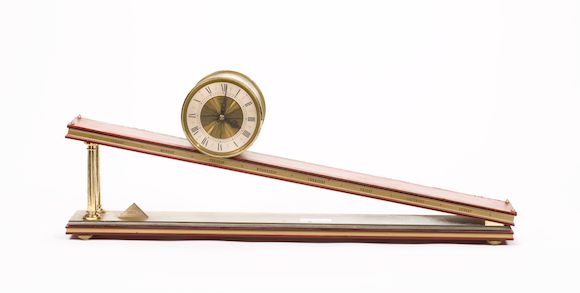 Bonhams : An inclined plane clock with day of the week indication circa ...