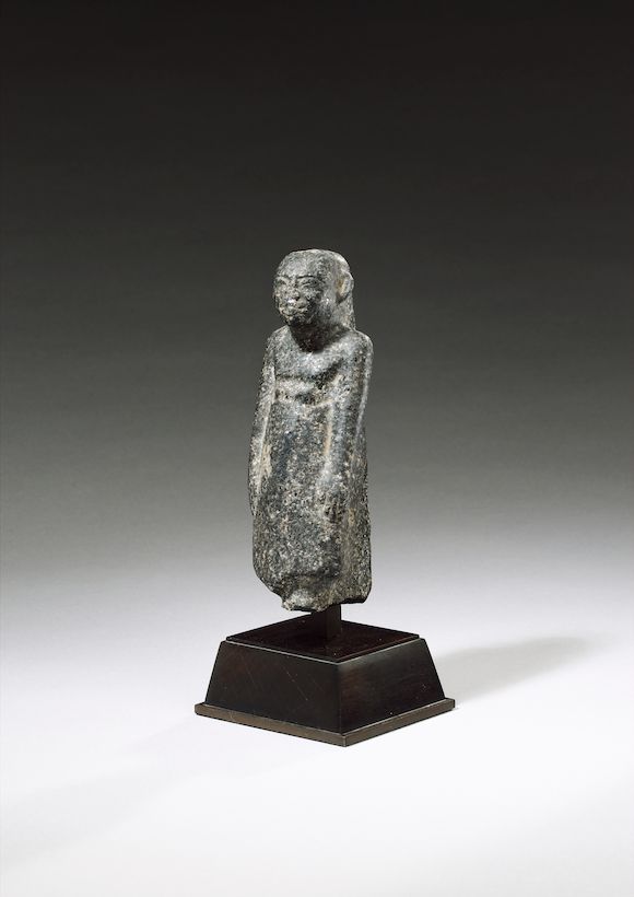 Bonhams : A Middle Kingdom grano-diorite standing figure of a high ...
