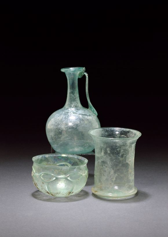 Bonhams : A Roman pale green glass beaker, a Roman pale green glass ...