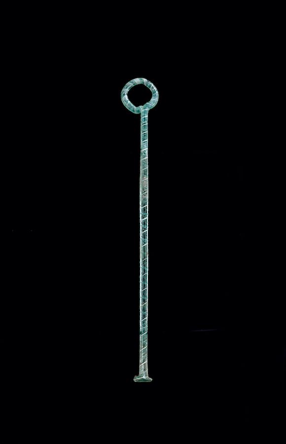 Bonhams : A Roman pale blue glass stirring rod
