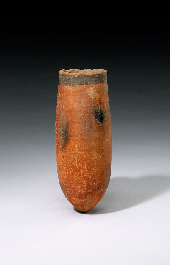Bonhams : An Egyptian red burnished pottery cup