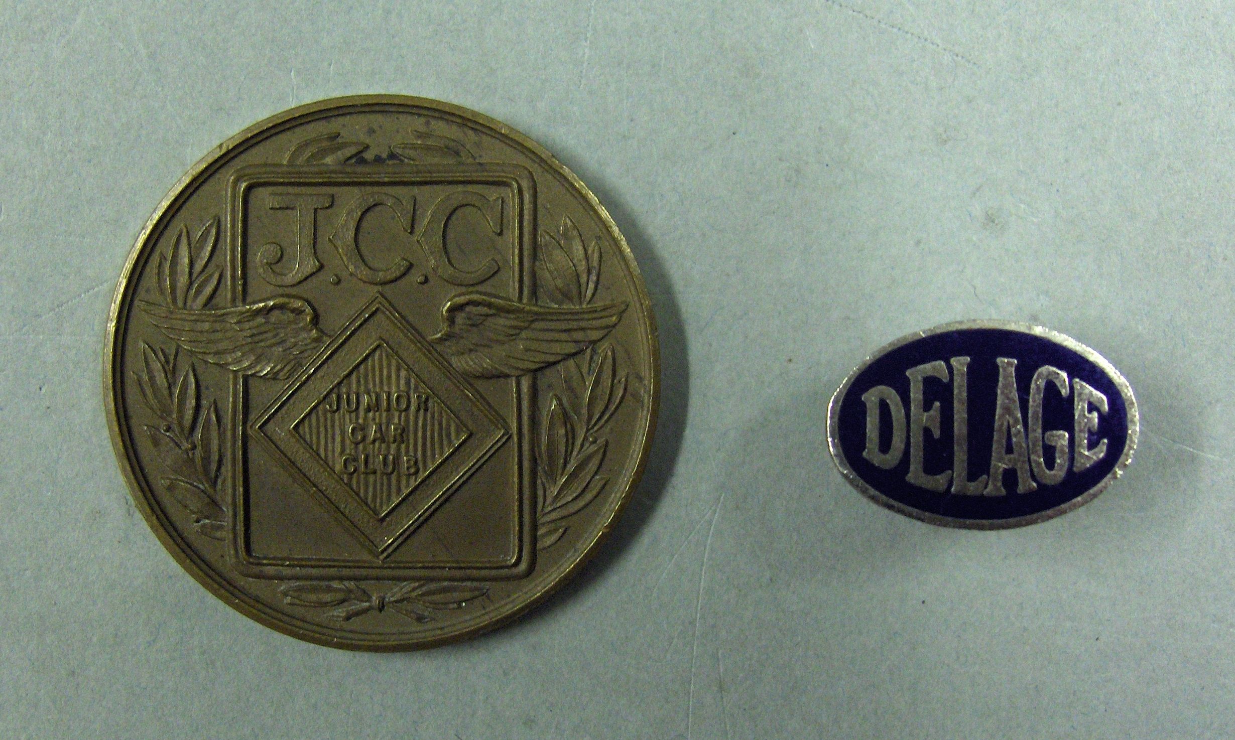 Bonhams Cars : A 1934 Junior Car Club bronze Rally medal,