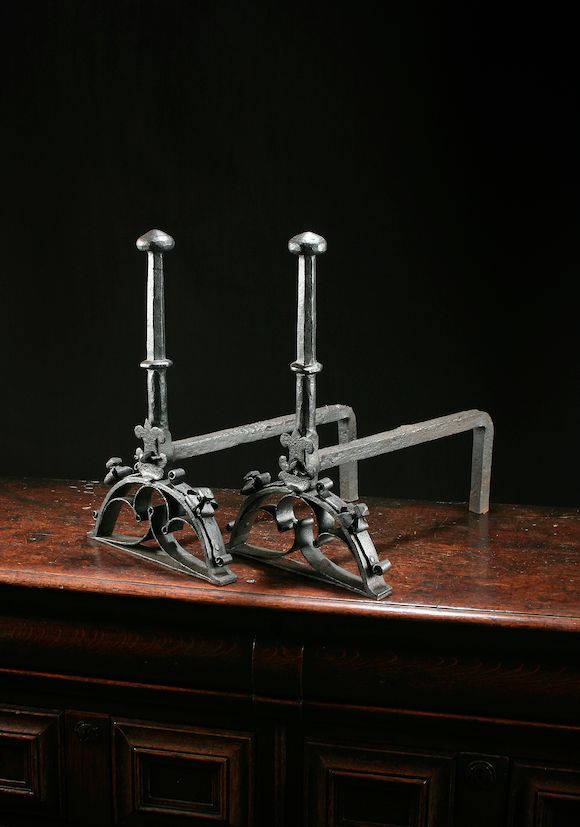 Bonhams : A pair of wrought iron fire dogs or andirons, probably 18th ...