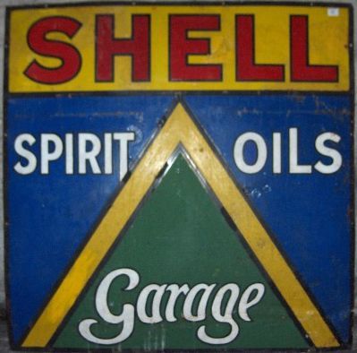 Bonhams Cars : A Rare Shell Garage enamel sign,