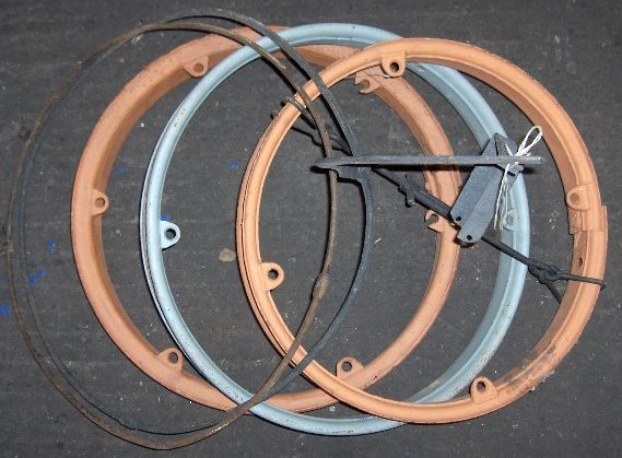 Bonhams Cars : Three Stepney wheels,