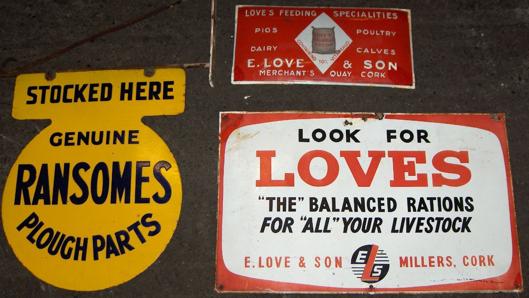 Bonhams Cars : Three agricultural enamel signs,