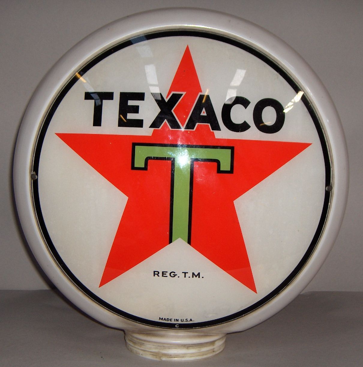 Bonhams Cars : A Texaco glass petrol pump globe,