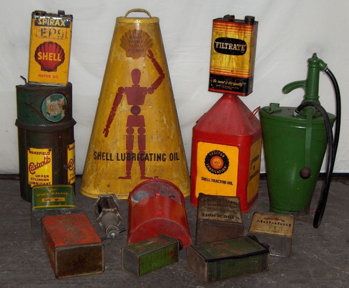 Bonhams Cars : Assorted oil dispensers, racks and cans,