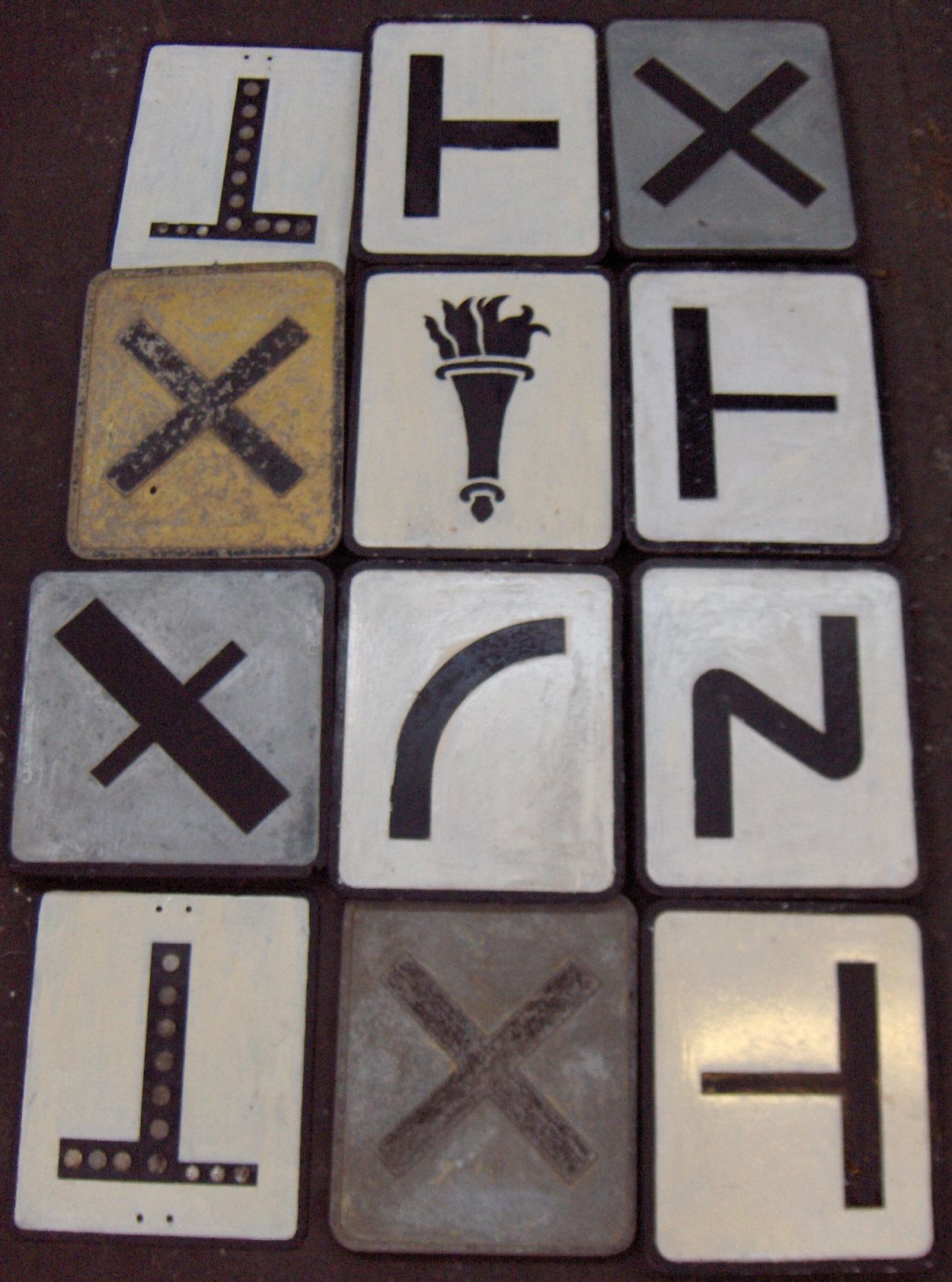 Bonhams Cars : A collection of twelve cast alloy road signs,