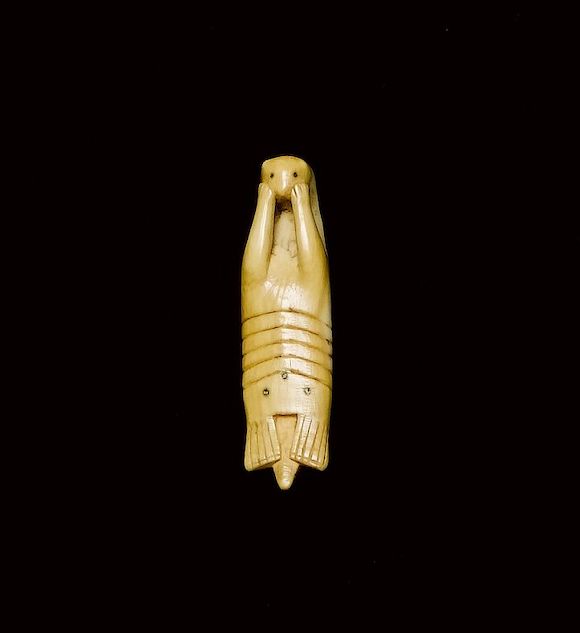 Bonhams : An Eskimo ivory sea otter amulet 3in (7.7cm)