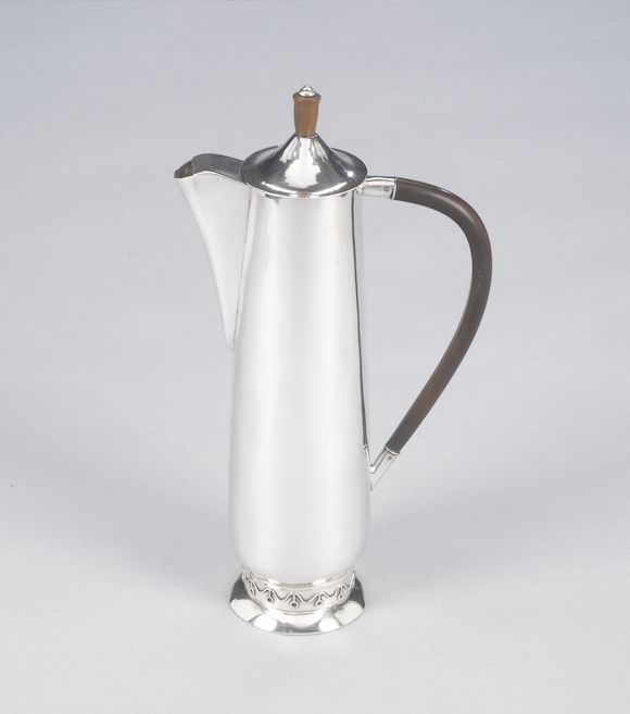 Bonhams : A silver hot water pot, maker's mark DMC, Birmingham 1959,