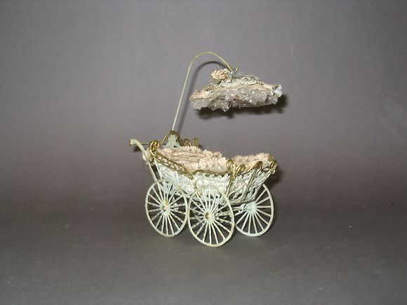 Bonhams : A miniature painted soft metal Dolls Pram, German Patent May ...
