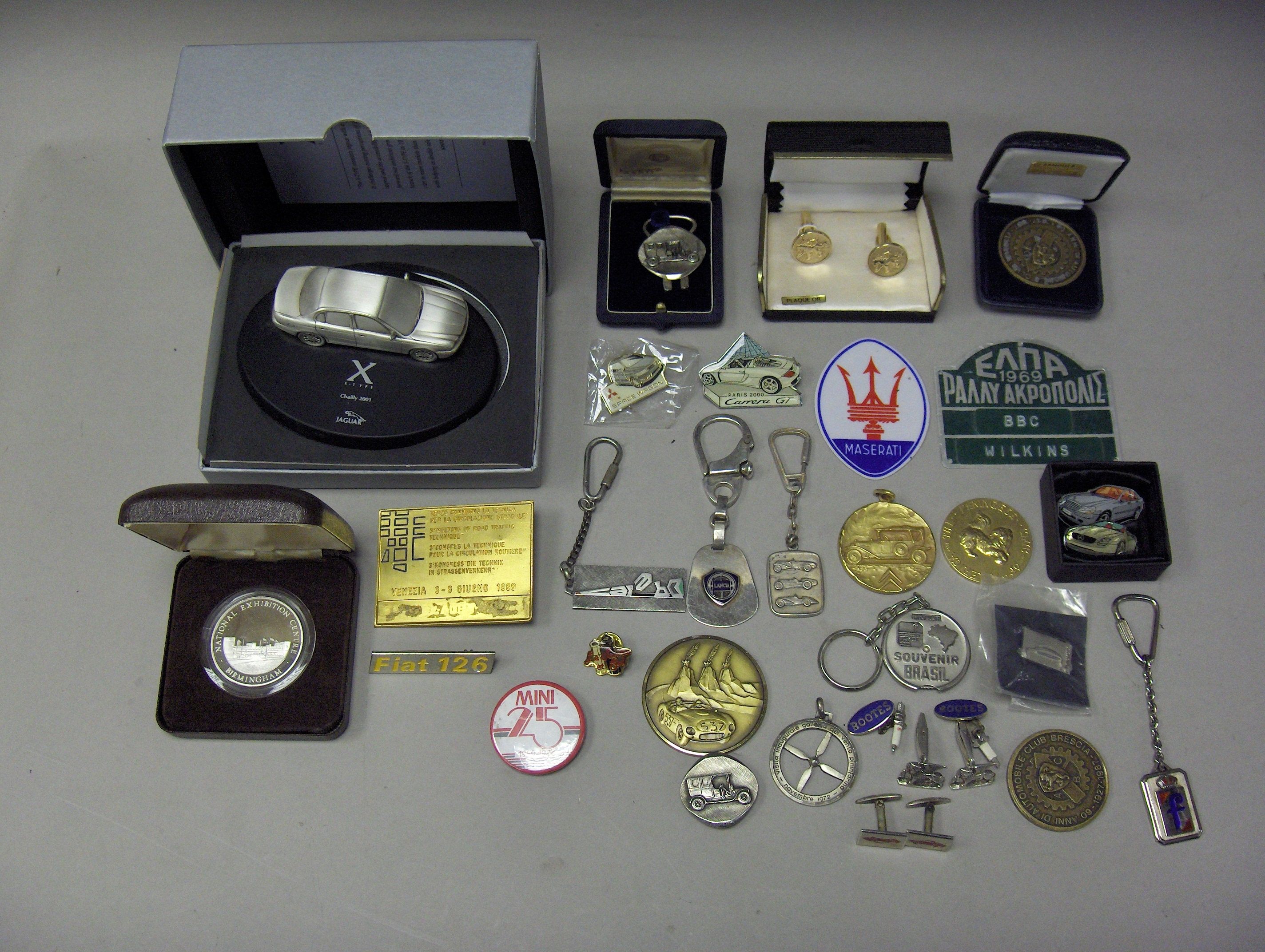 Bonhams Cars : A quantity of motoring badges and medals,