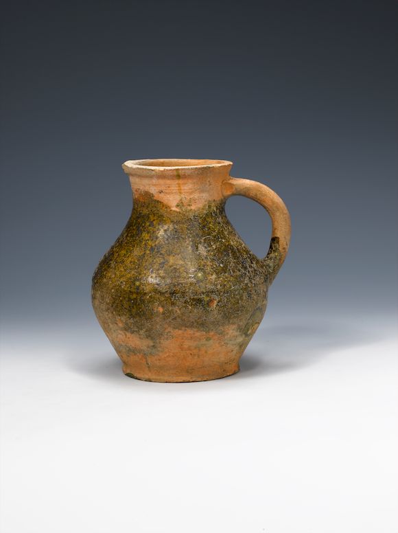 Bonhams : A good mediaeval jug 13th or 14th century