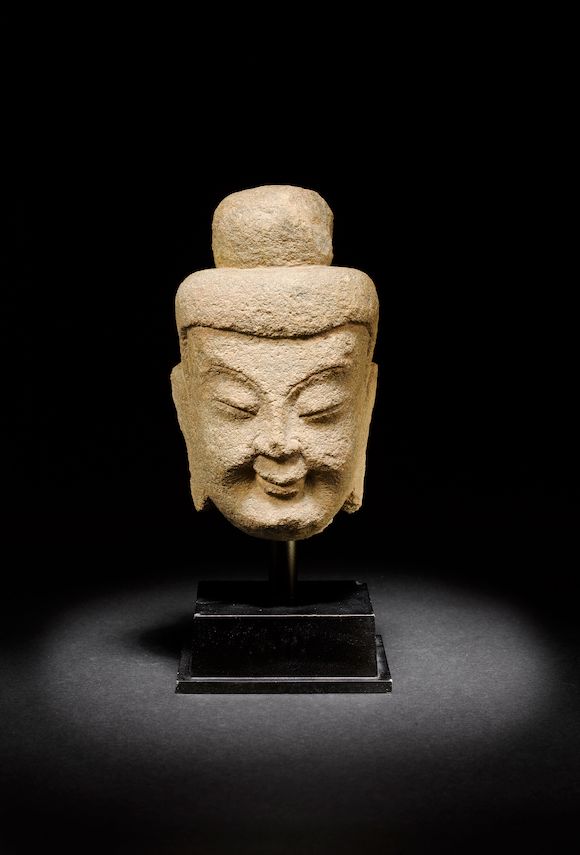 Bonhams : A Yungang buff sandstone head of the Buddha Northern Wei Dynasty