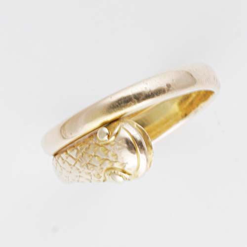 Bonhams : An 18ct gold double headed serpent ring, (4)