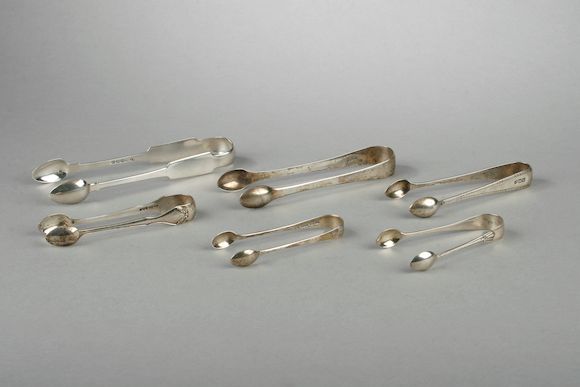 Bonhams : A pair of Irish sugar tongs and five others