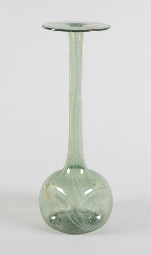 Bonhams : A Clutha glass vase designed by Christopher Dresser
