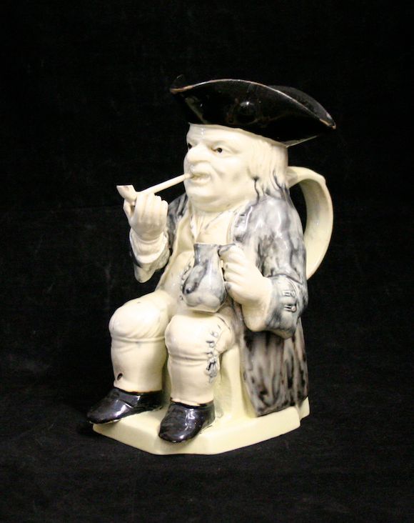 Bonhams : A Wood type creamware 'Step' Toby jug, circa 1780